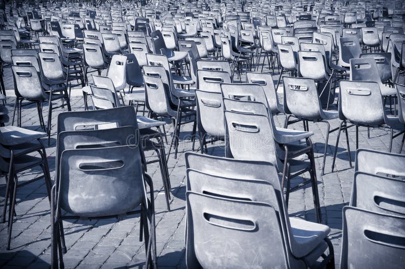 Multitude of Empty Chair on Road Pavement Stock Photo - Image of chair ...