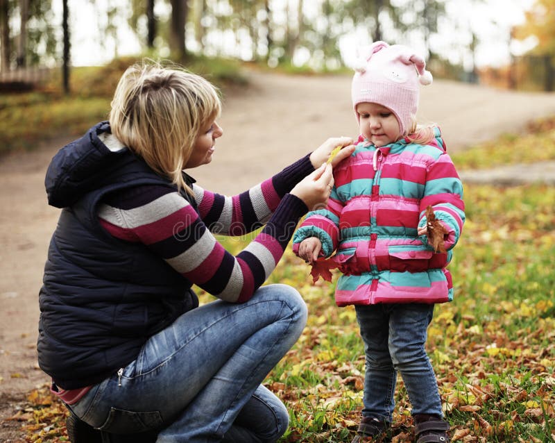 Mum with a Daughter in Autumn Park Stock Photo - Image of mamma, mater ...