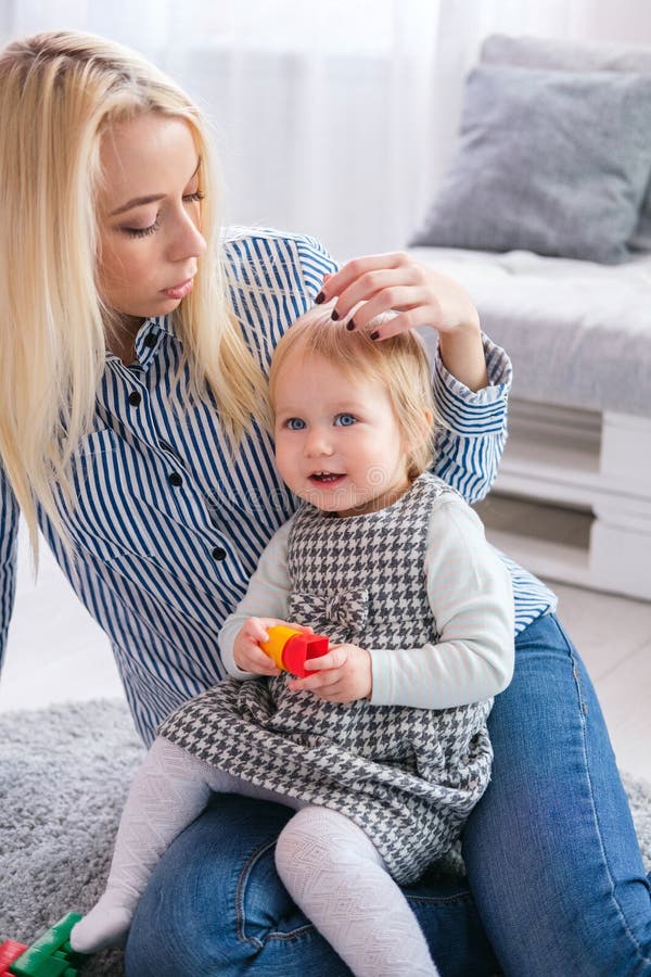Mum with the Daughter Play To a Room Stock Image - Image of build ...
