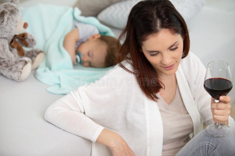 Mum Having Glass Wine while Baby Sleeps Stock Photo - Image of people ...