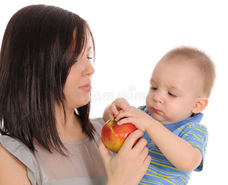 Mum, the son and an apple stock image. Image of snack - 18679873