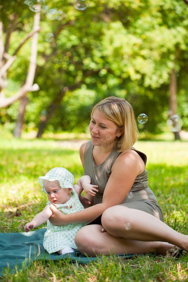 Mum walks with the child stock image. Image of mommy - 20922219