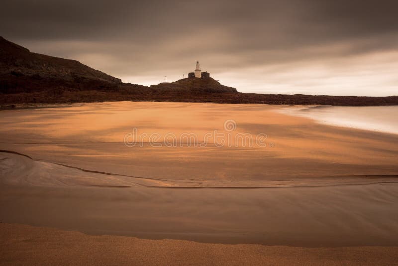 Mumbles lighthouse Swansea stock image. Image of beach - 58022683