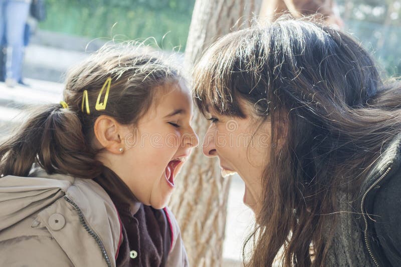 Mother and Daughter Shouting Loud Stock Photo - Image of face ...