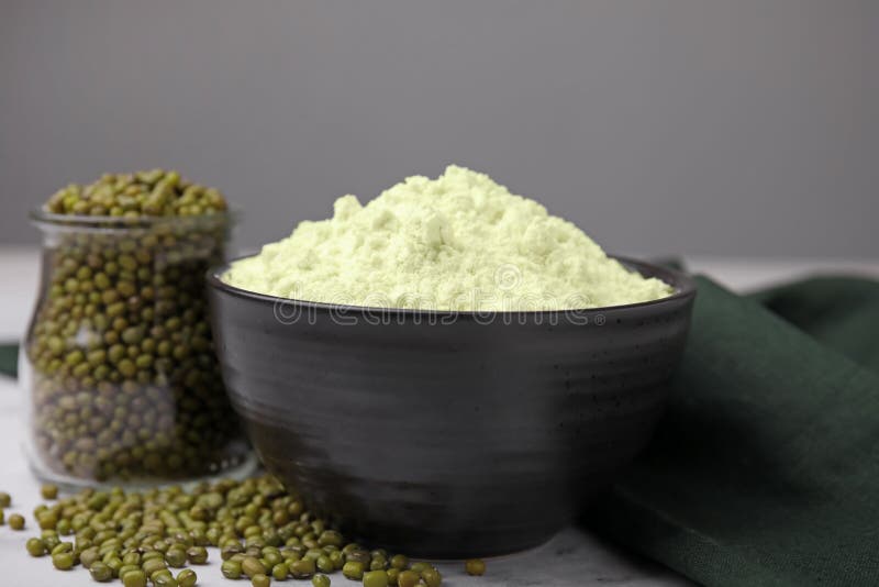 Mung Bean Flour in Bowl and Seeds on White Marble Table Stock Photo ...
