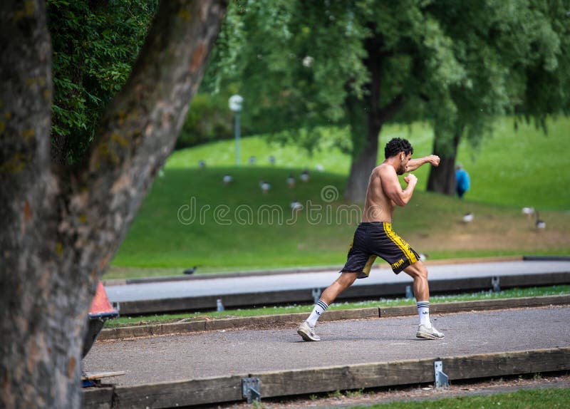MUNICH, GERMANY - Jun 01, 2020: Strong Athletic Young Man Performs ...