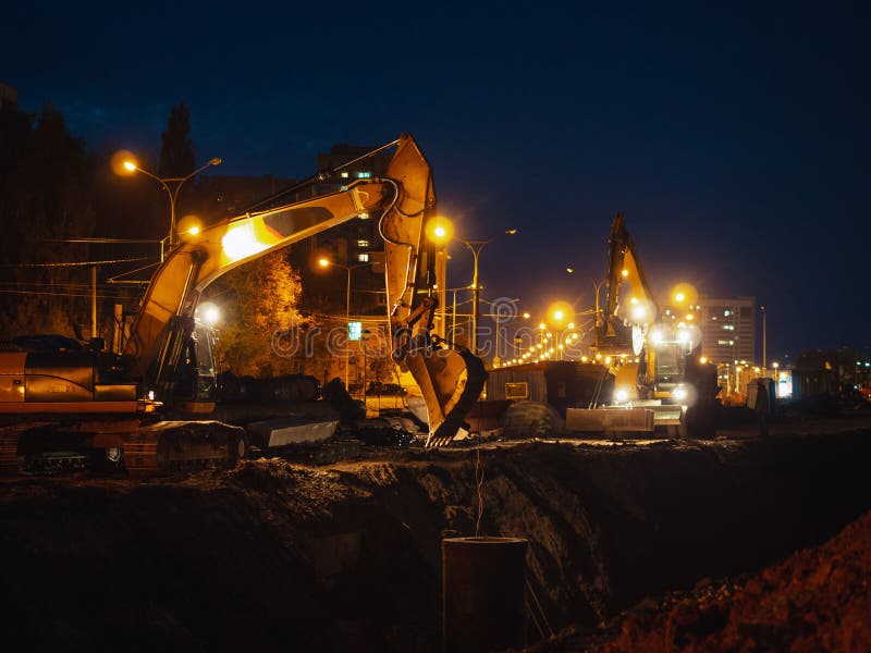 Municipal night works stock image. Image of excavator - 176914797