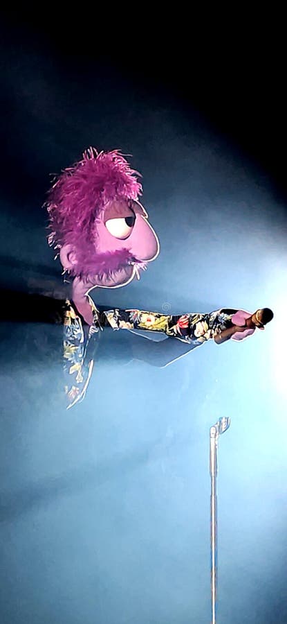 Muppet rock band singer stock image. Image of blue, singer - 241036971