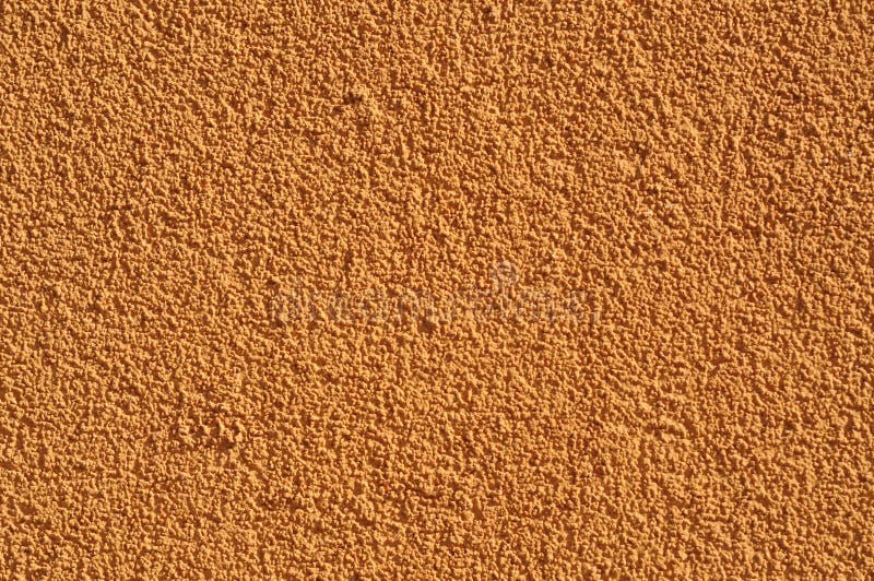Mur ocre de stuc image stock. Image du orange, texture - 14179511