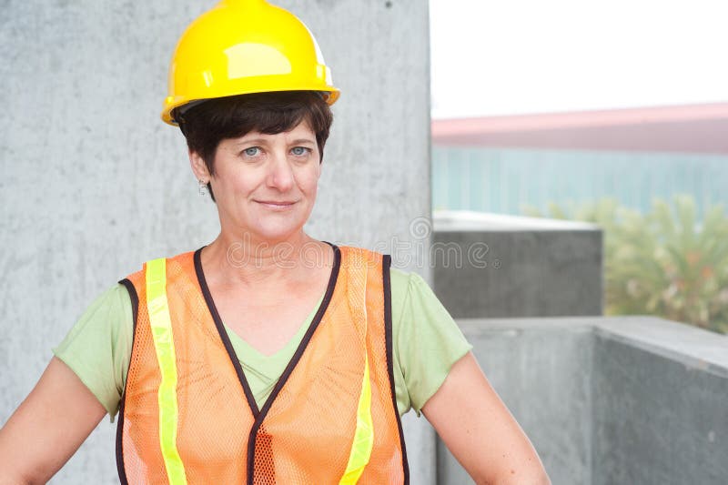 Muratore Della Donna Con Il Casco Immagine Stock - Immagine di ...