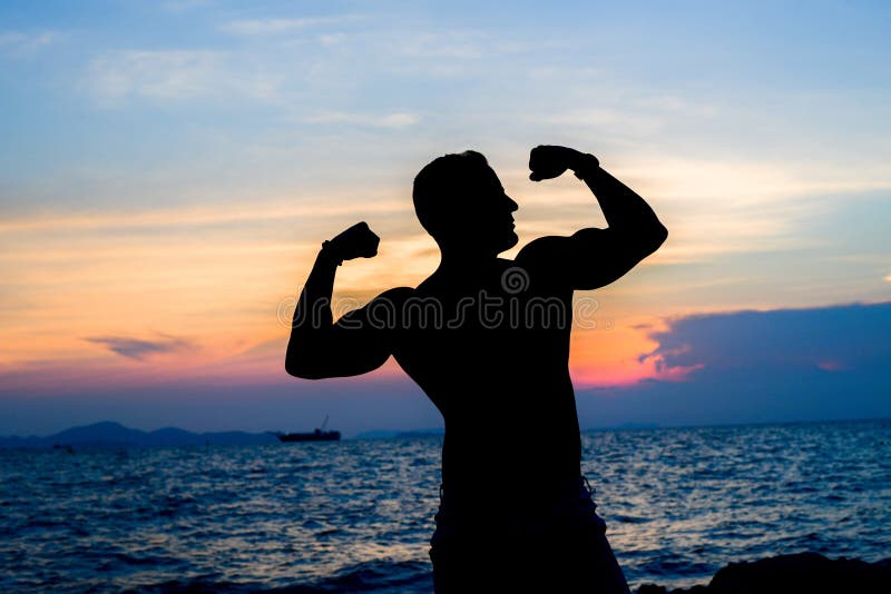Muscle on the Beach Silhouette on Sunset Stock Photo - Image of beach ...
