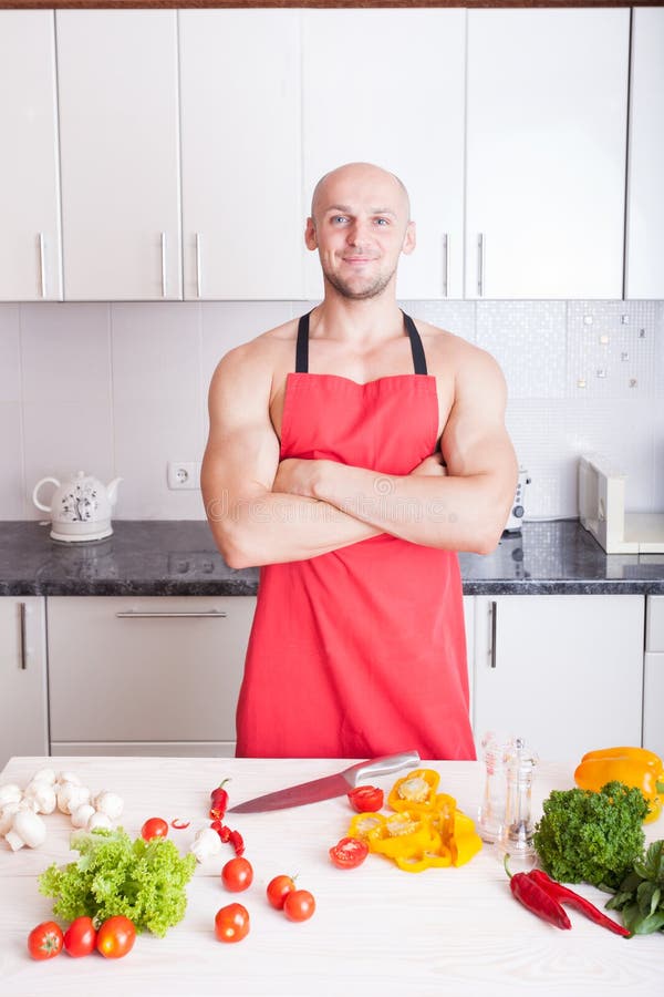 Muscle man cooking stock photo. Image of salad, kitchen - 58255340