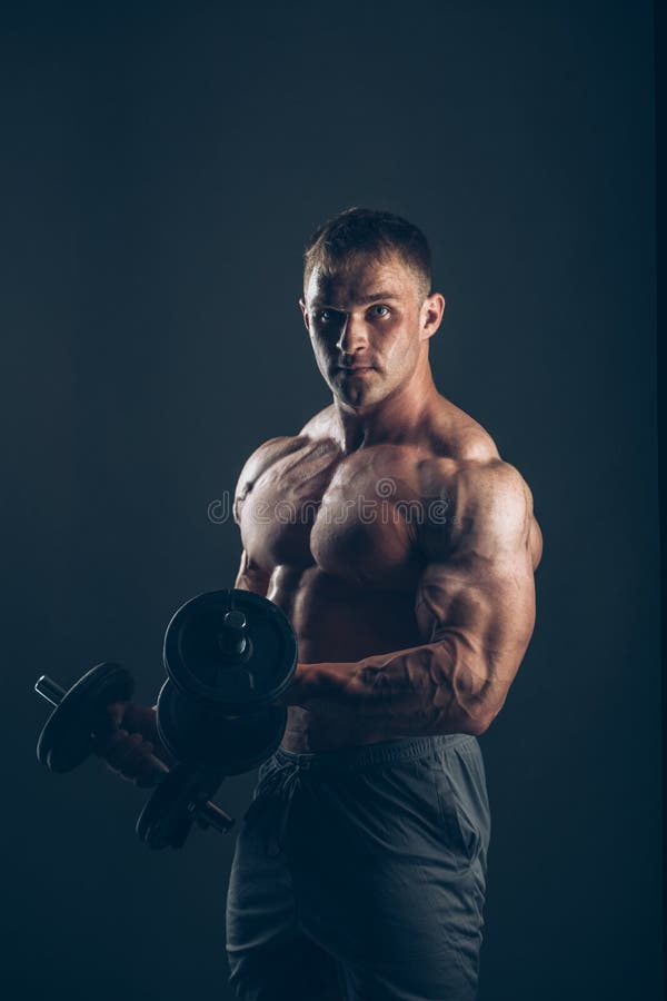Muscle Man Doing Bicep Curls Stock Photo - Image of dumbbells, healthy ...