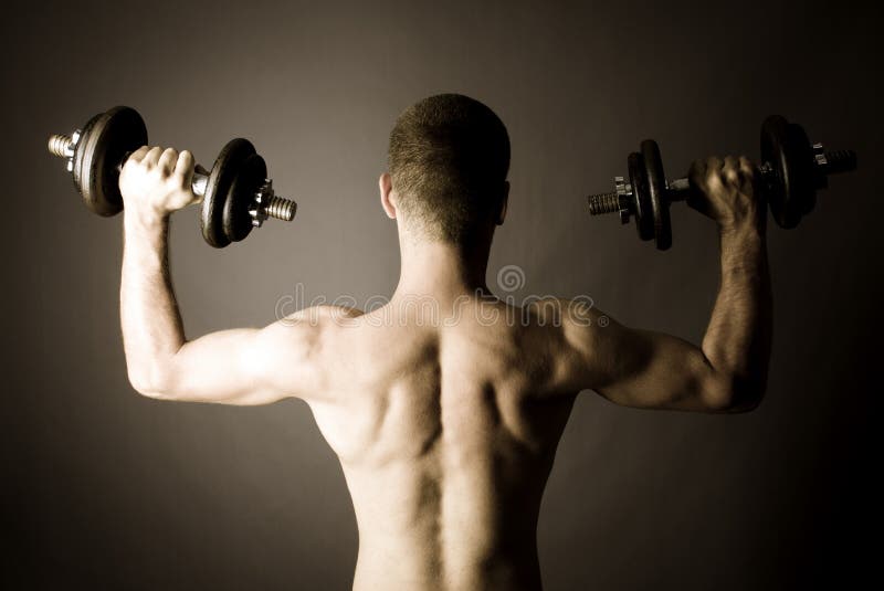 Muscle Man Lifting Dumbbells Stock Image - Image of modern, caucasian ...