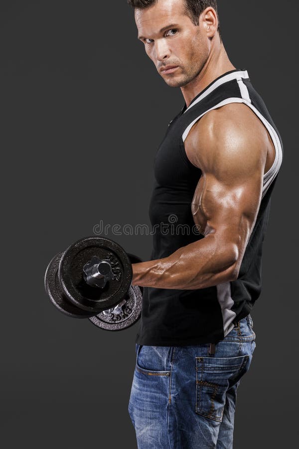 Muscle man lifting weights stock photo. Image of working - 50552768