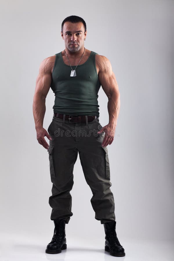 Muscle Man in Military Clothing Stock Photo - Image of hands, male ...