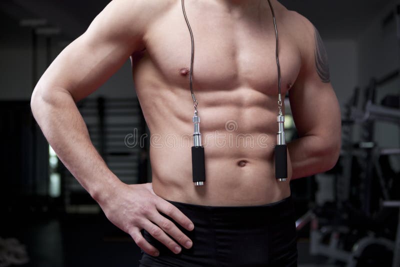 Muscle man with rope stock photo. Image of nipple, exercise - 14099244