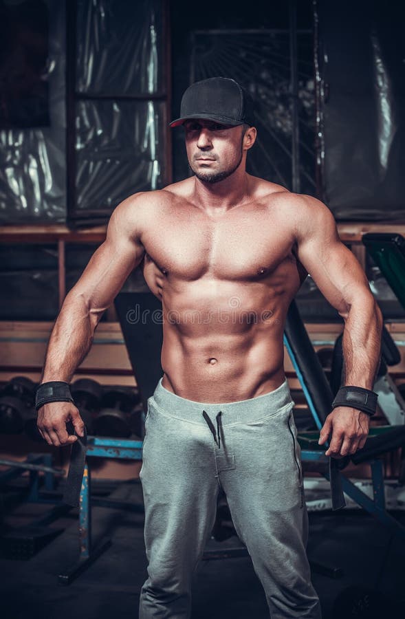 Muscle man who is posing stock image. Image of adult - 45782387