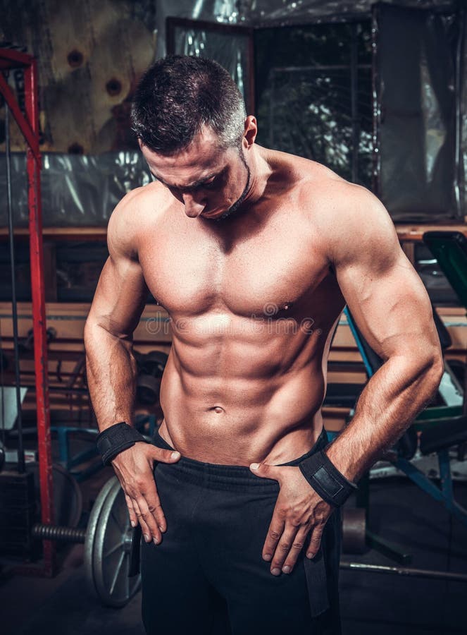 Muscle man who is posing stock image. Image of attractive - 45782409
