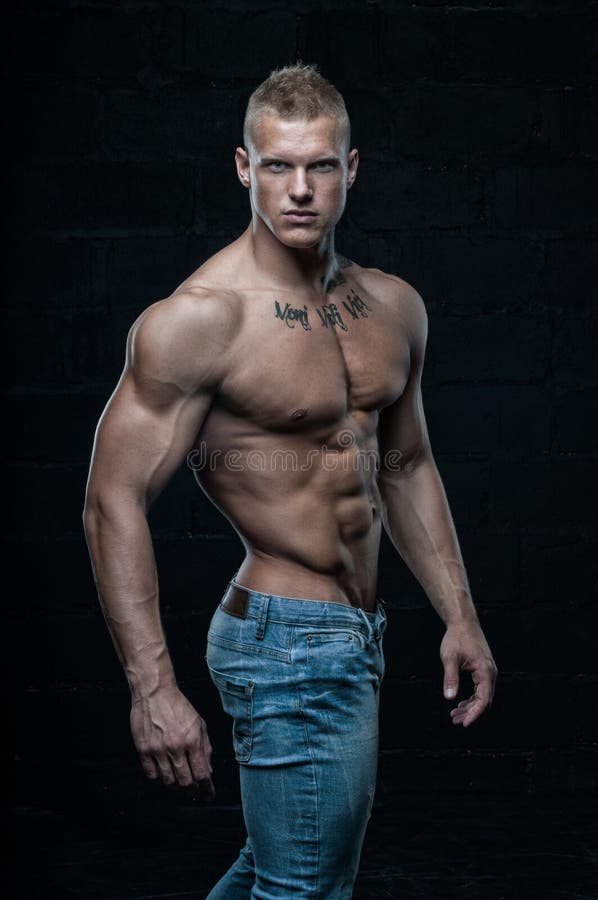 Muscled model with ink stock image. Image of athlete - 49218559