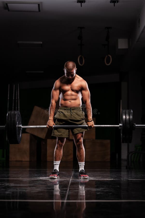 Muscular Athlete Lifting Very Heavy Barbell Stock Photo - Image of ...