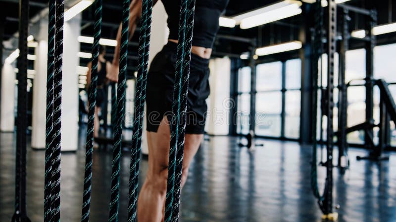 Muscular Athlete Strengthening Muscles Using Resistance Bands ...