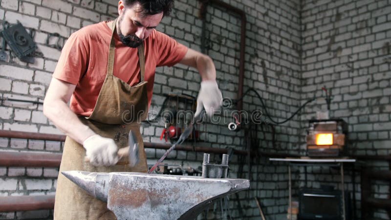 Muscular Blacksmith in Forge Hammering Steel Products Stock Video ...