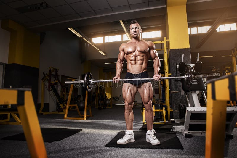 Muscular Bodybuilder Guy Doing Exercises with Dumbbell Stock Image ...