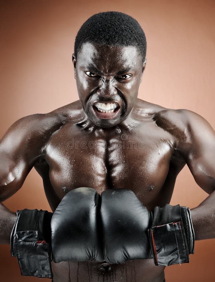 Muscular Boxer with Intense Emotion Stock Photo - Image of macho, boxer ...