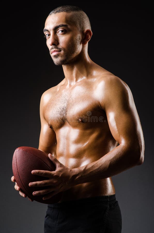 Muscular football player stock image. Image of fitness - 51092253