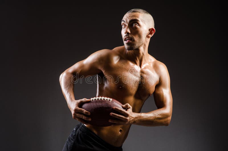 Muscular football player stock photo. Image of leisure - 51434288