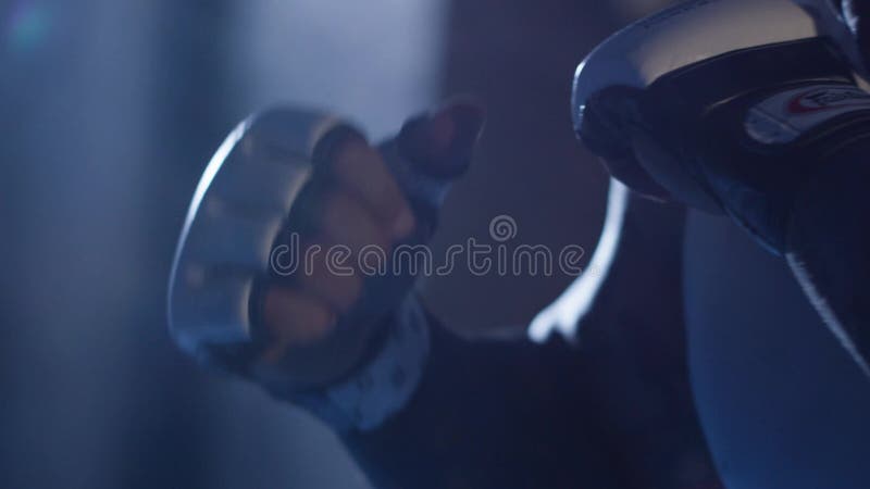 Muscular Handsome Fighter Giving a Forceful Forward Kick during a ...