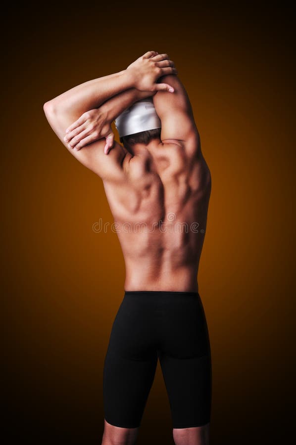 Muscular Male Swimmer Posing from Behind with Full Equipment Stock ...