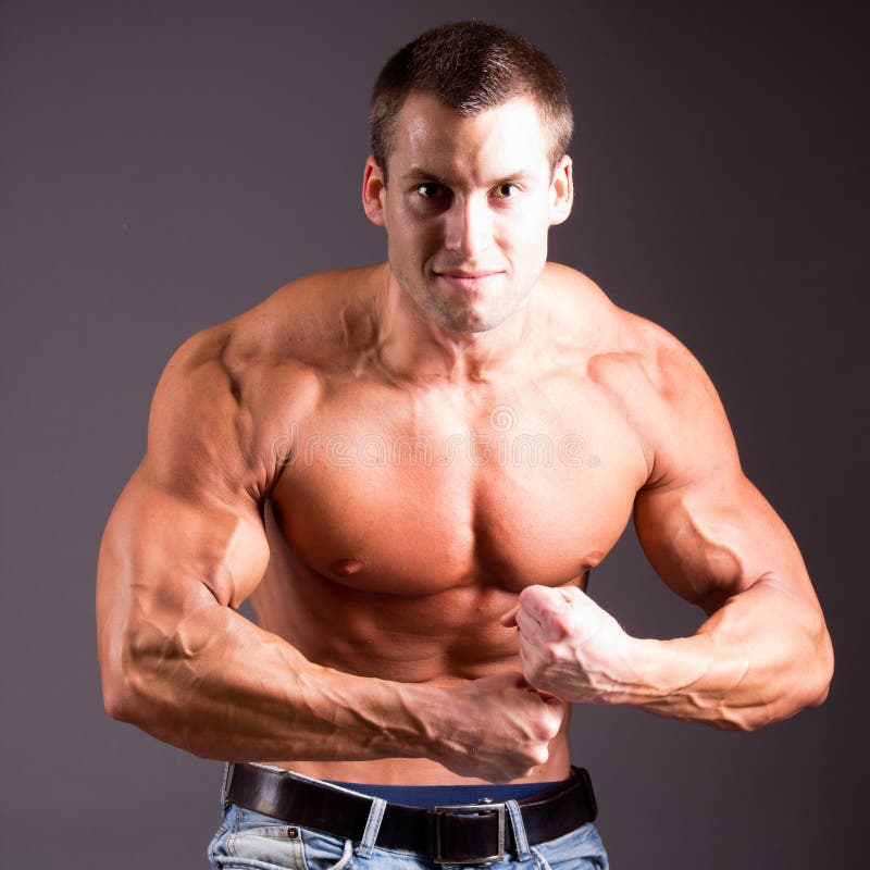 Muscular man stock photo. Image of jeans, build, bicep - 28744484