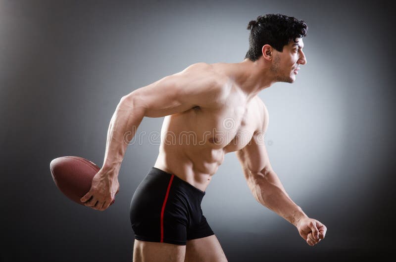 The Muscular Man with American Football Stock Image - Image of playing ...