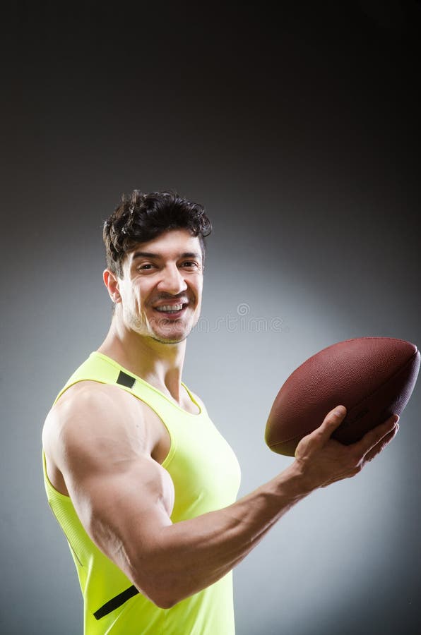 The Muscular Man with American Football Stock Photo - Image of american ...