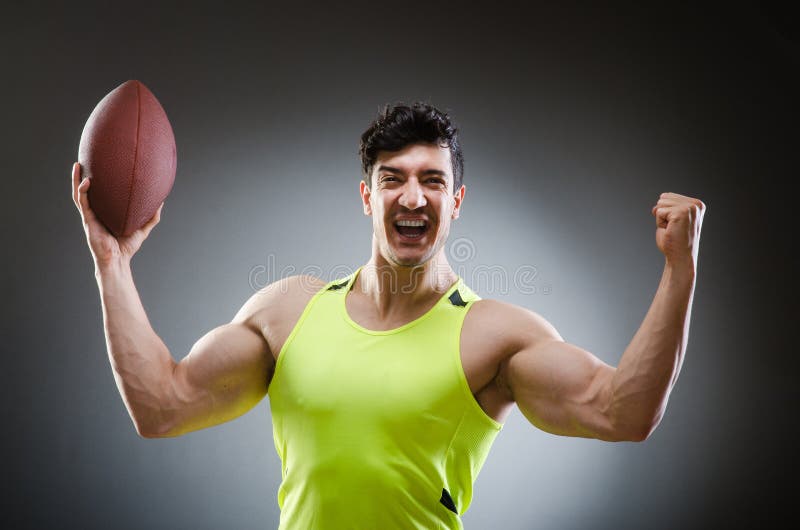 The Muscular Man with American Football Stock Photo - Image of ...