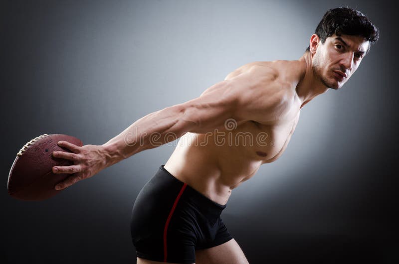 The Muscular Man with American Football Stock Photo - Image of ...