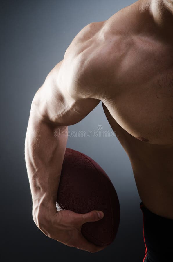 The Muscular Man with American Football Stock Image - Image of ...