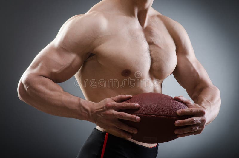 The Muscular Man with American Football Stock Photo - Image of ...