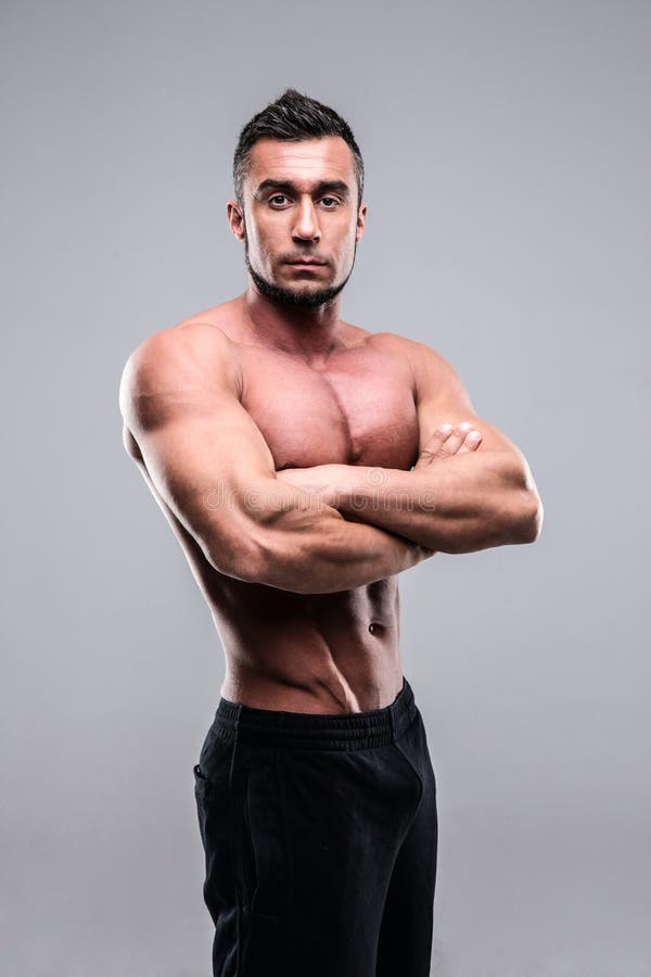 Muscular Man with Arms Folded Stock Photo - Image of athletic ...