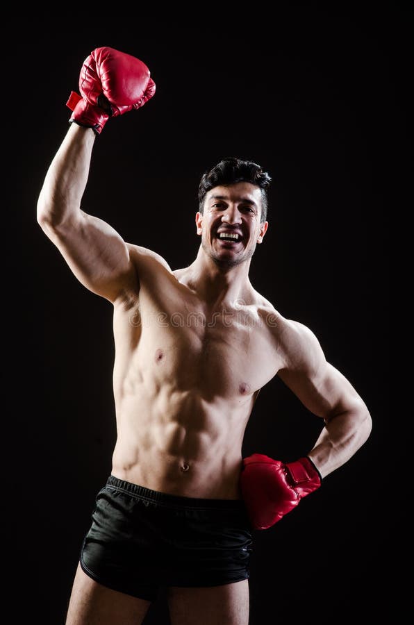 Muscular Man in Boxing Concept Stock Photo - Image of hitting, fist ...
