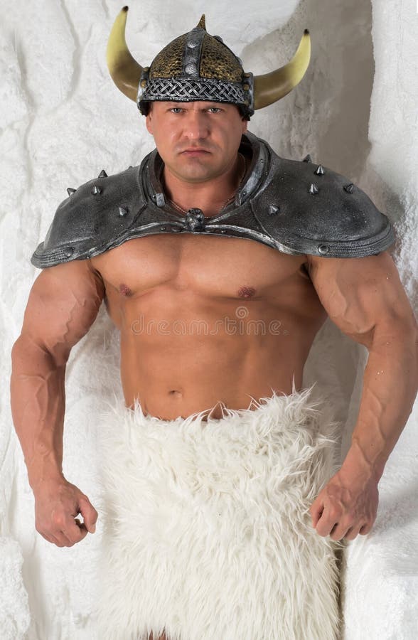 A Muscular Man in Costume Viking with a Stock Photo - Image of ...