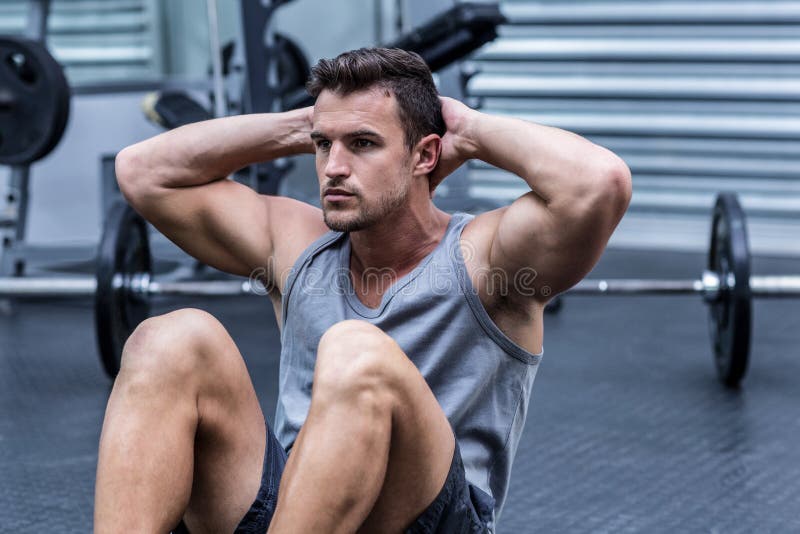 Muscular Man Doing Abdominal Crunch Stock Image - Image of sitting ...