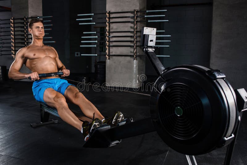 Muscular Man Doing Exercise for Legs in the Gym Stock Image - Image of ...