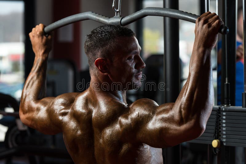 Muscular Man Doing Heavy Weight Exercise for Back Stock Photo - Image ...