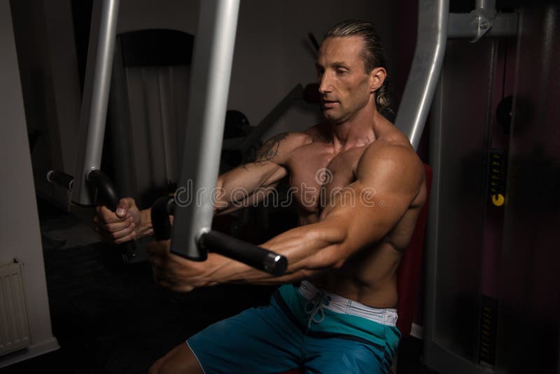 Muscular Man Doing Heavy Weight Exercise for Chest Stock Image - Image ...