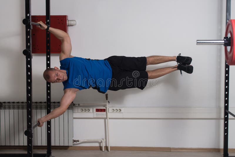 Muscular Man Doing Human Flag Exercise Stock Image - Image of training ...