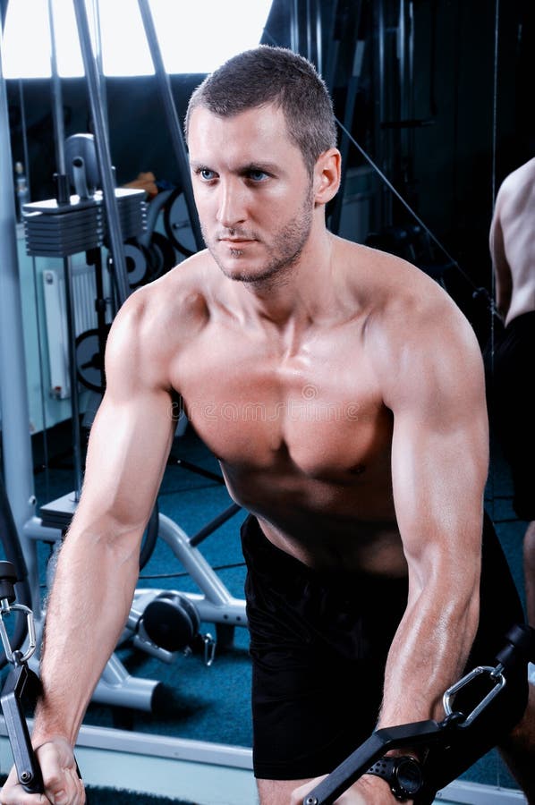 Muscle Man Exercise on Sport Gym Fitness Club Stock Image - Image of ...