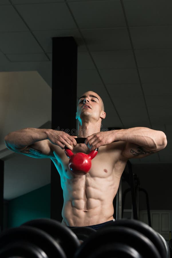 Muscular Man Exercise with KettleBell Stock Photo - Image of handsome ...